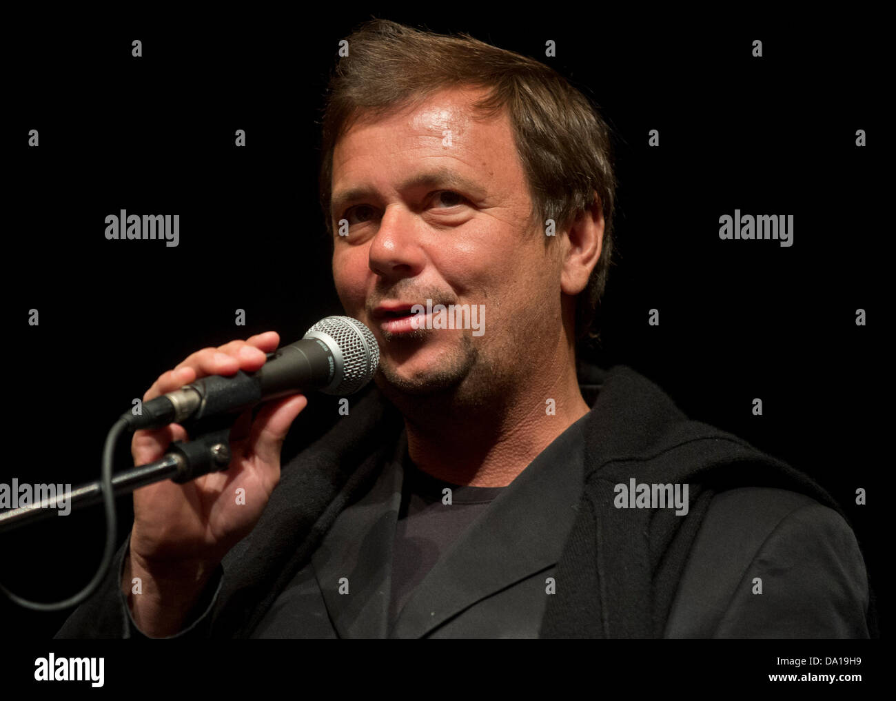 French director, producer and scenarist Philippe Godeau listens to a ...