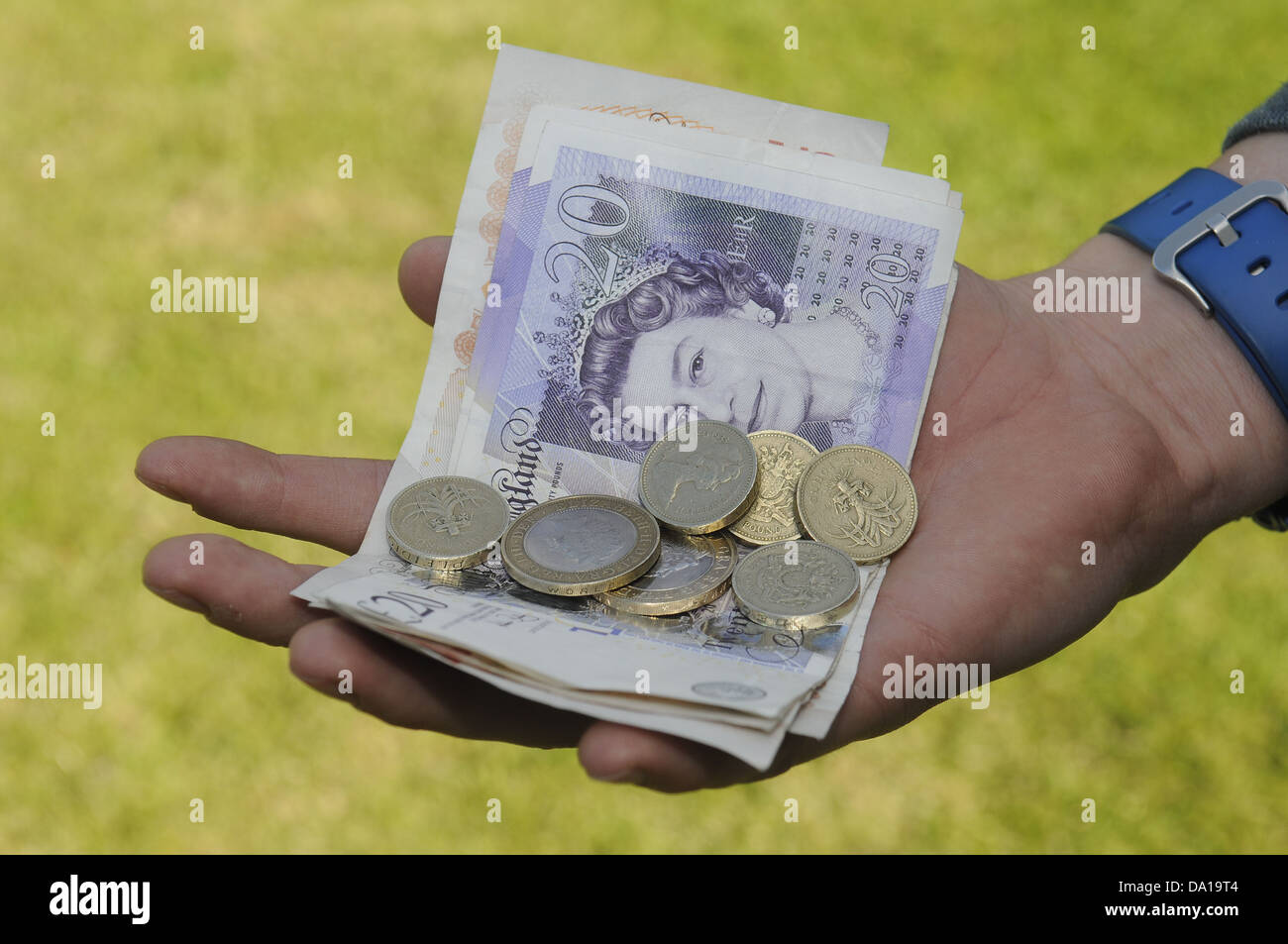 Money Held In Hand Stock Photo - Alamy