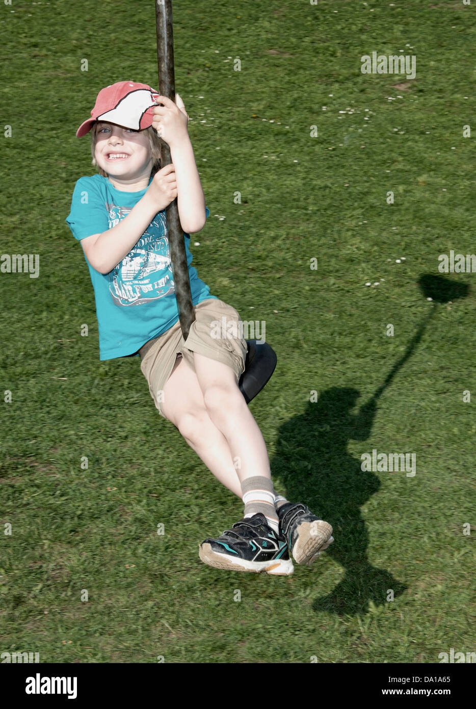 Shadow child on playground swing hi-res stock photography and images - Alamy
