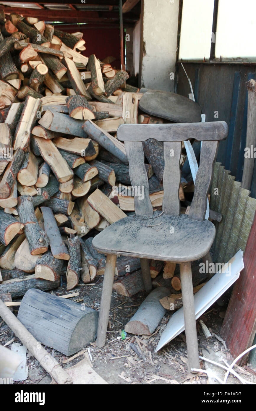 Picture of dirty wooden chair in old penthouse Stock Photo - Alamy