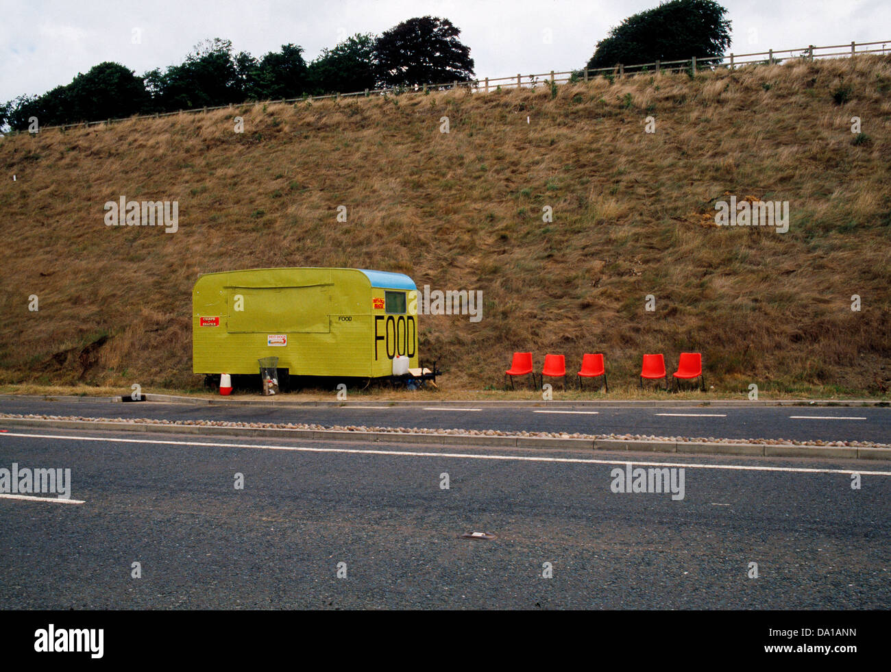 Green catering caravan with red seats outside, England, UK Stock Photo ...