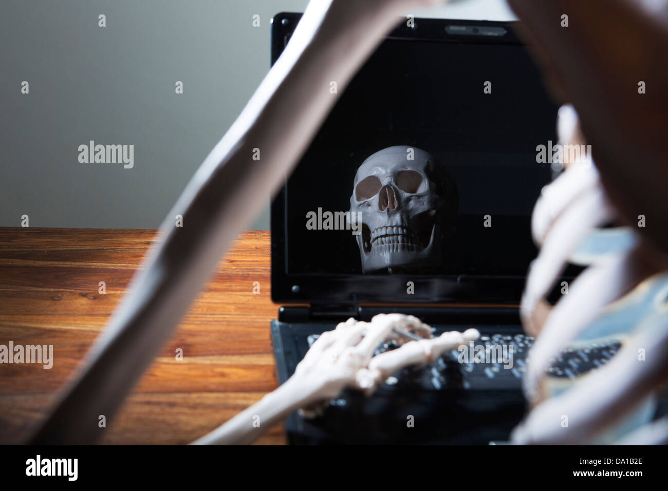 Skeleton at computer hi-res stock photography and images - Alamy