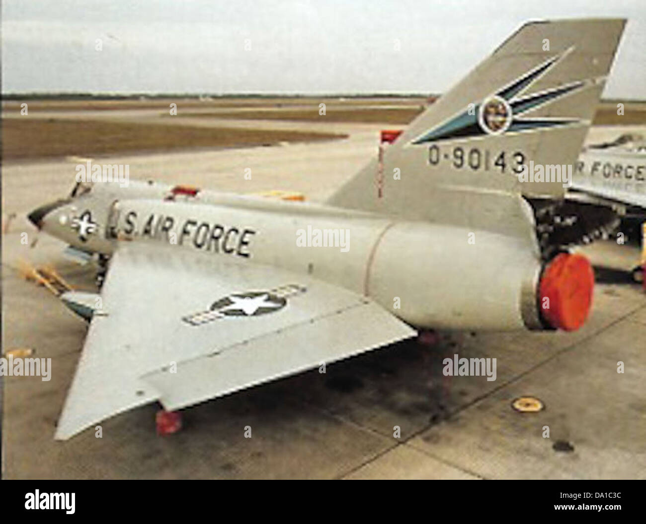 This image features an F-106 Delta Dart fighter aircraft from the 319th Fighter-Interceptor ...