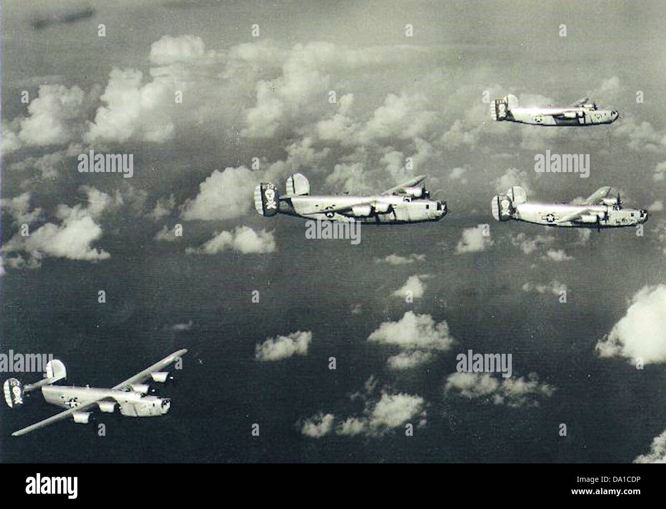 This photograph captures B-24 bombers from the 90th Bomb Group in 1943 ...