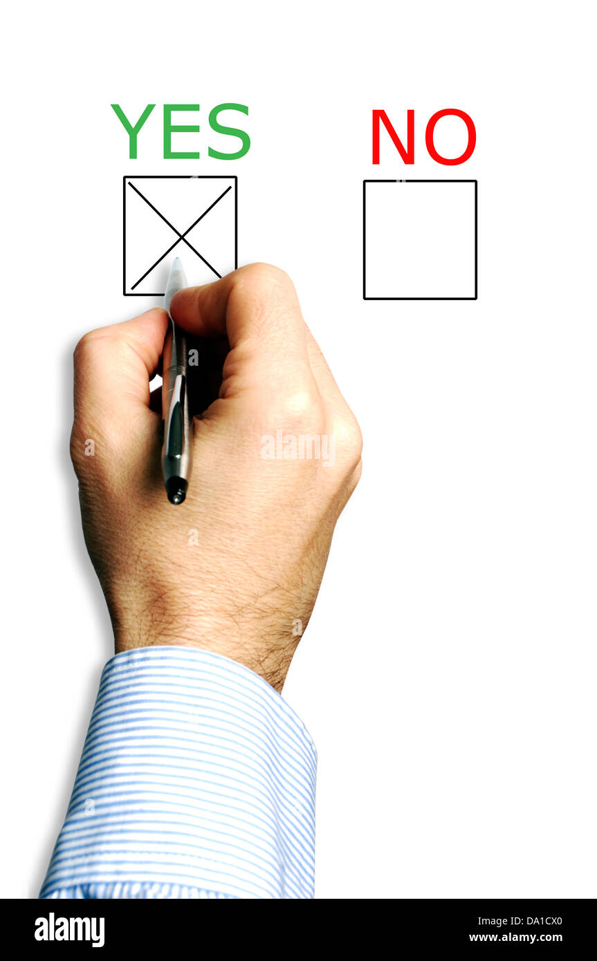 hand with pen choosing yes answer Stock Photo - Alamy
