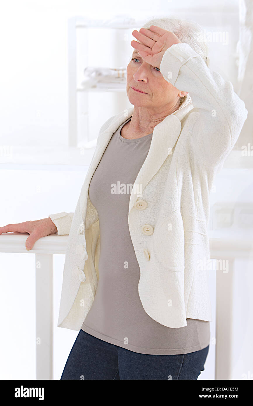 ELDERLY PERSON WITH VERTIGO Stock Photo - Alamy