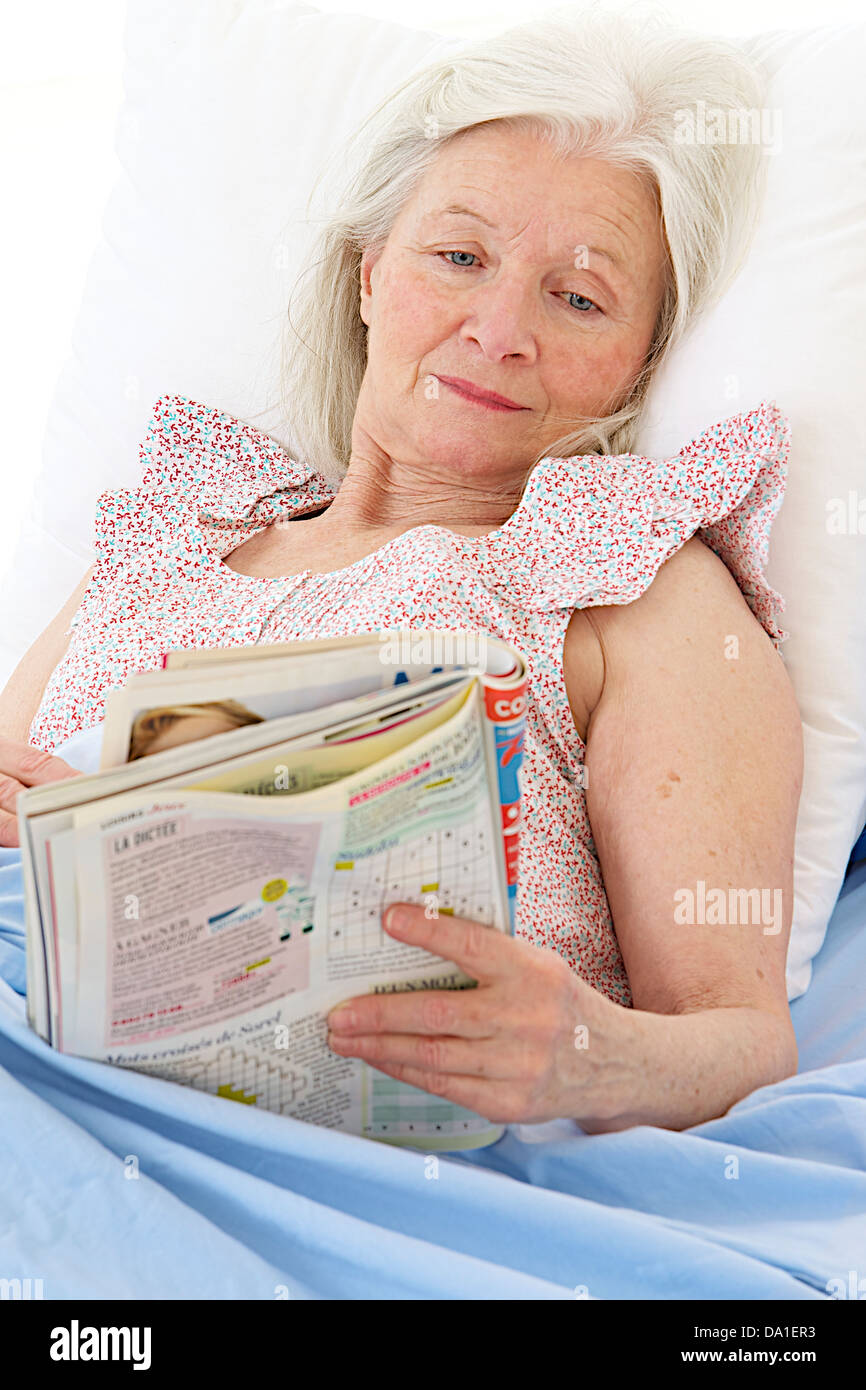 Elderly bed reading hi-res stock photography and images - Alamy