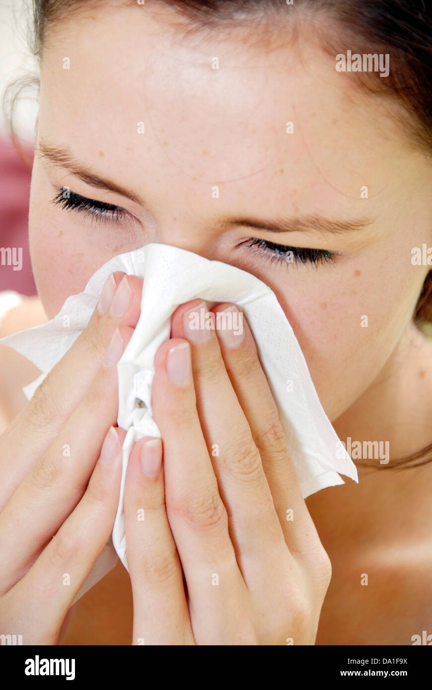WOMAN WITH RHINITIS Stock Photo - Alamy