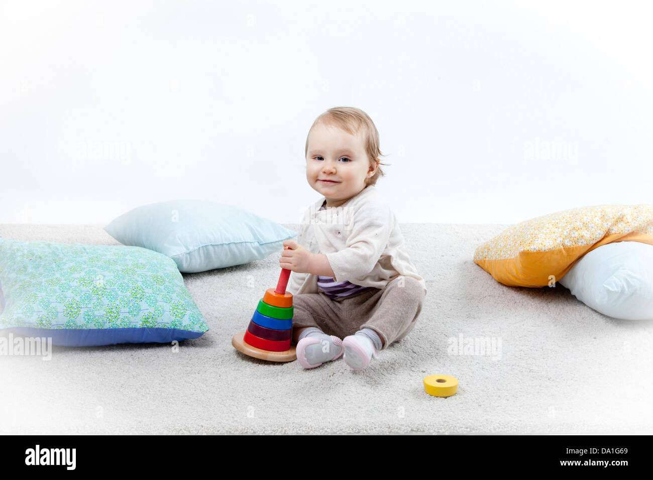 INFANT PLAYING INDOORS Stock Photo - Alamy