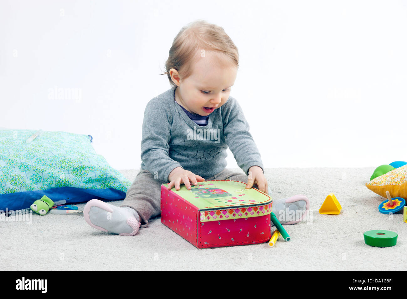 Infant and playing and toy hi-res stock photography and images - Alamy