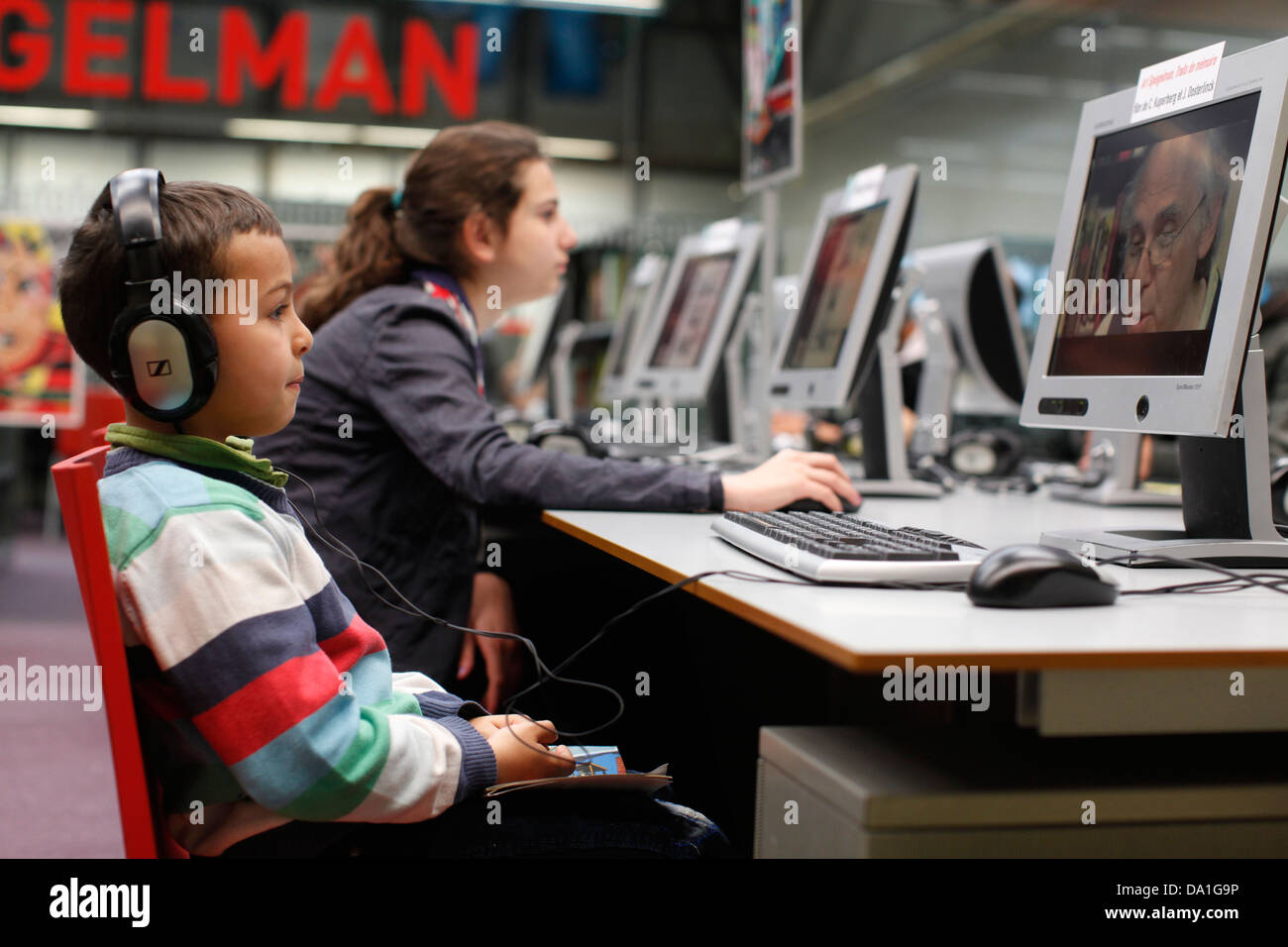 Youth in a public library Stock Photo - Alamy