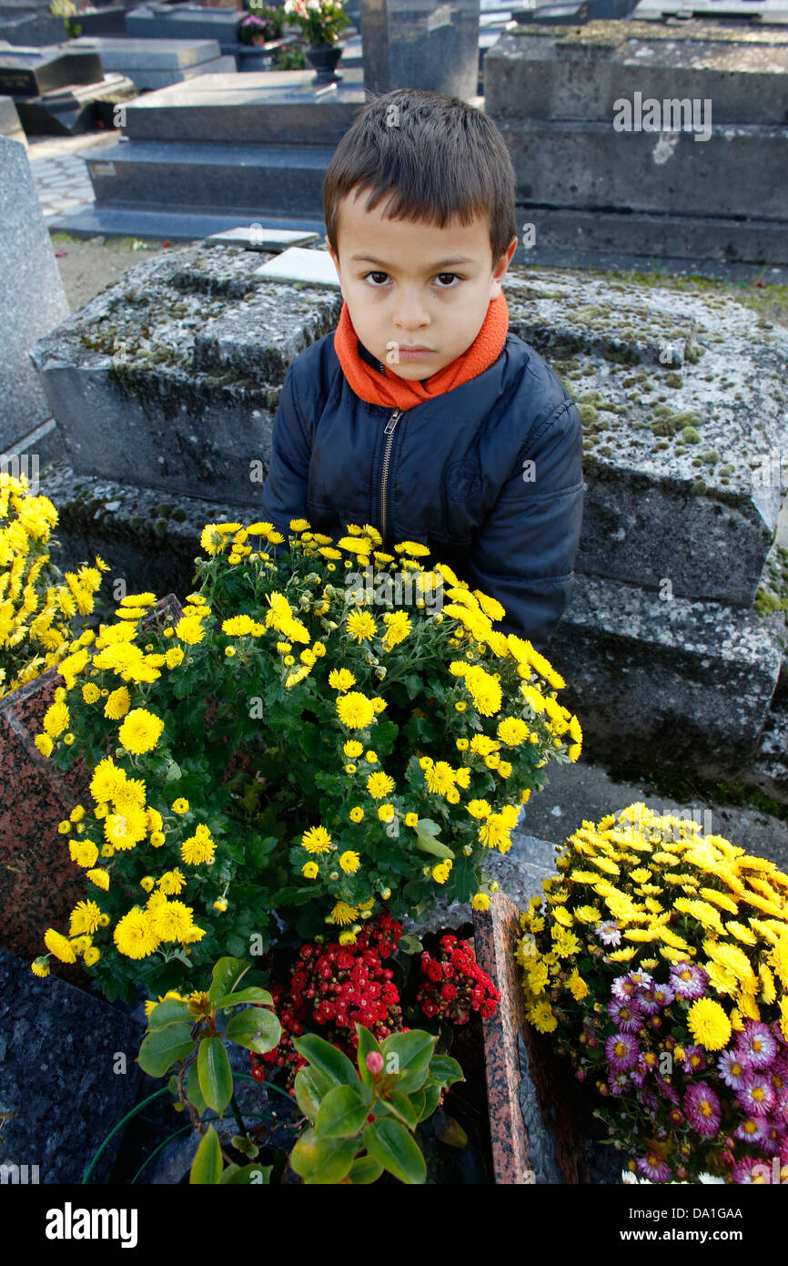 Child in graveyard Stock Photo - Alamy