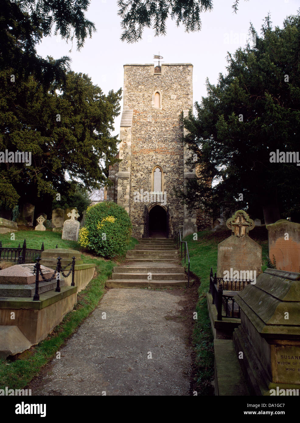 The C14th flint tower and W porch of St Martin's C5th/6th church, seen ...