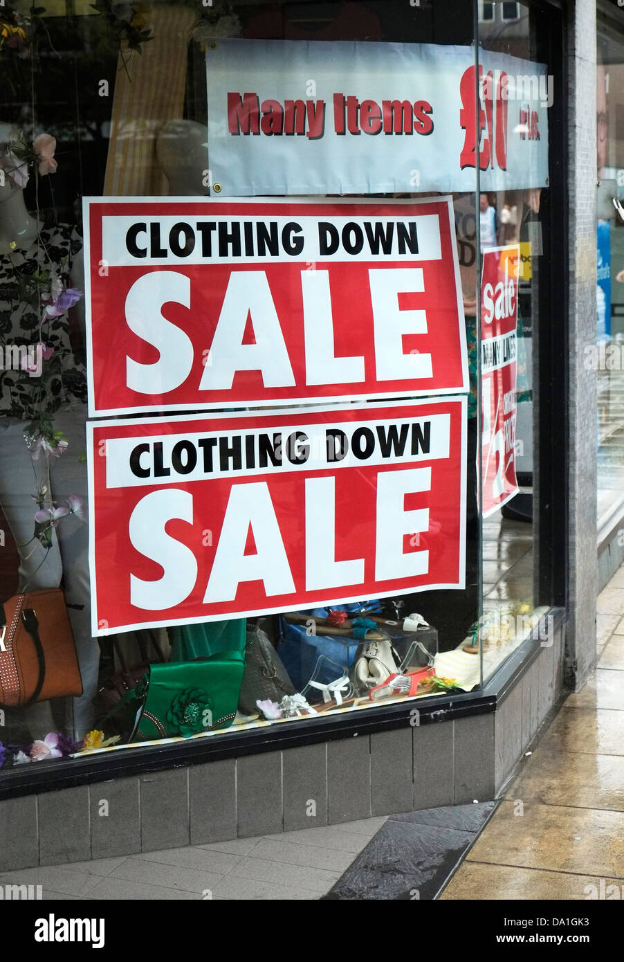 A sale sign in a shop window Stock Photo - Alamy