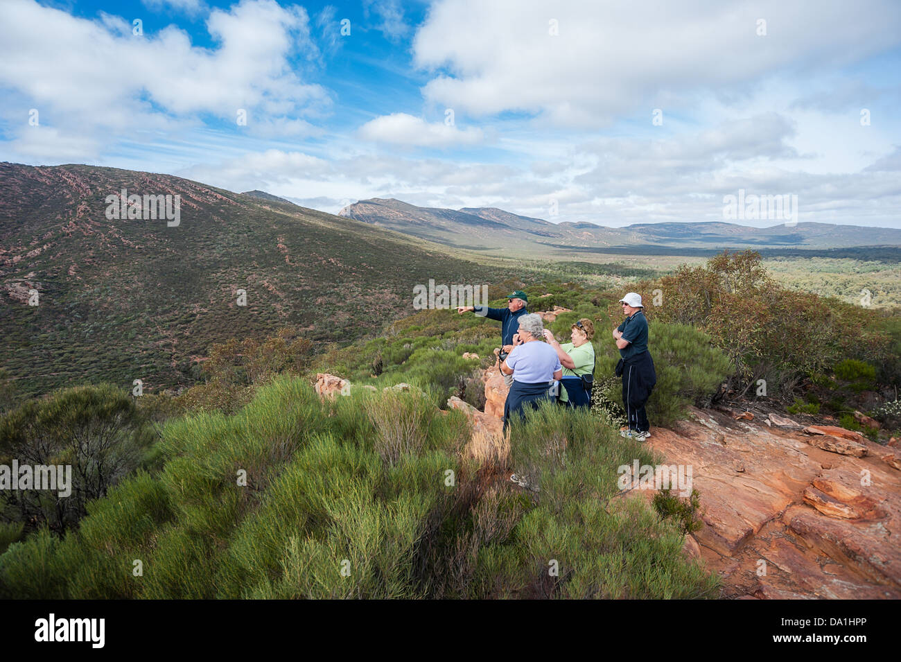 Tourists admire the view from a Wilpena Pound lookout in the ...