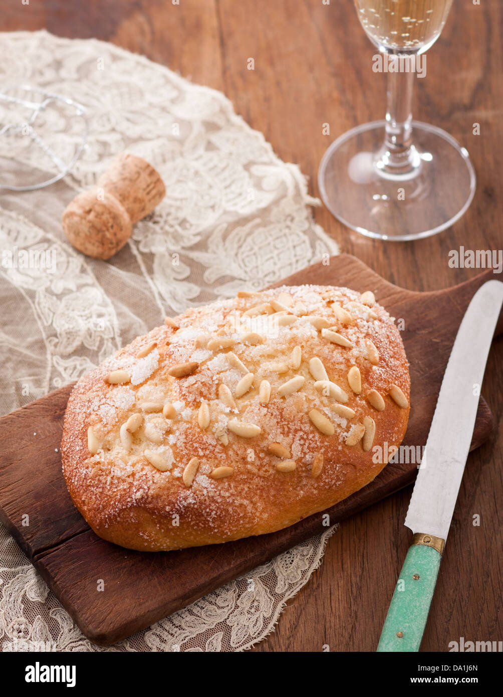Traditional Catalan pine nuts brioche for Sant Joan Stock Photo - Alamy