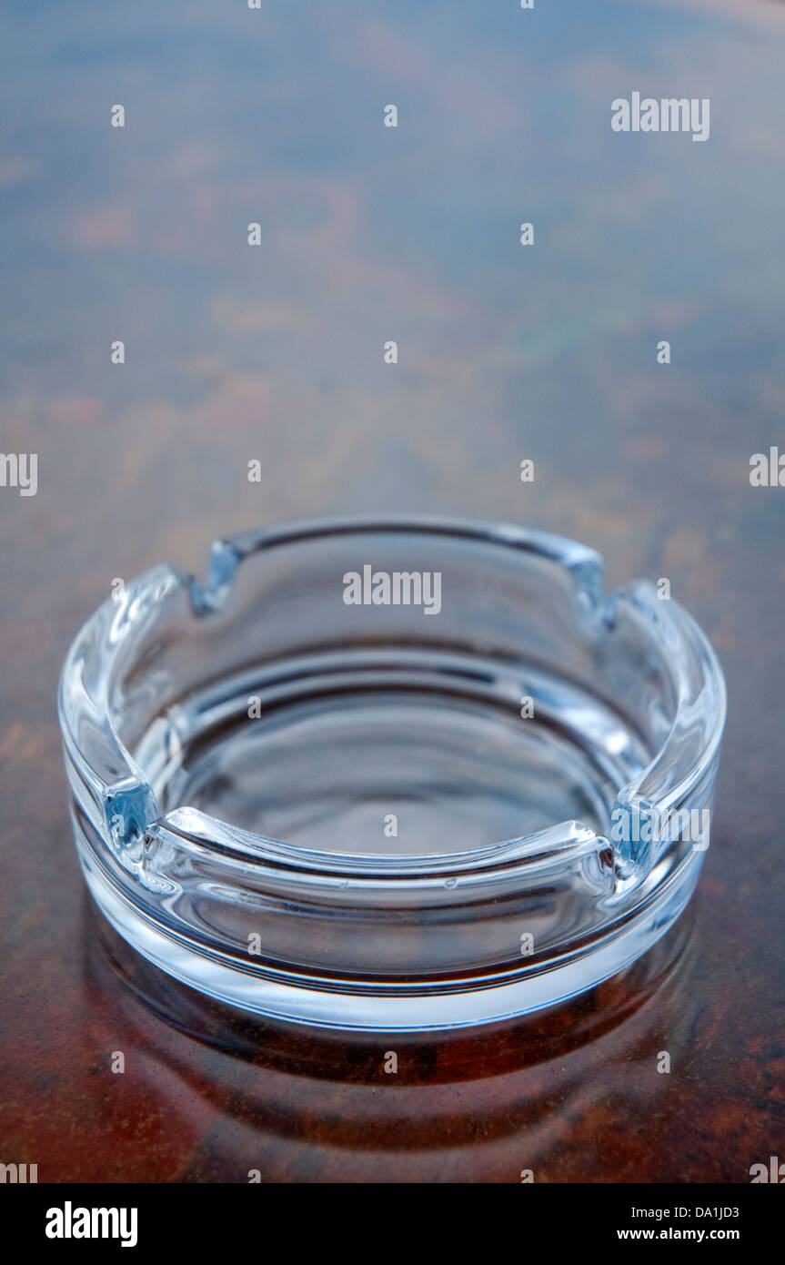 Empty glass ashtray Stock Photo - Alamy