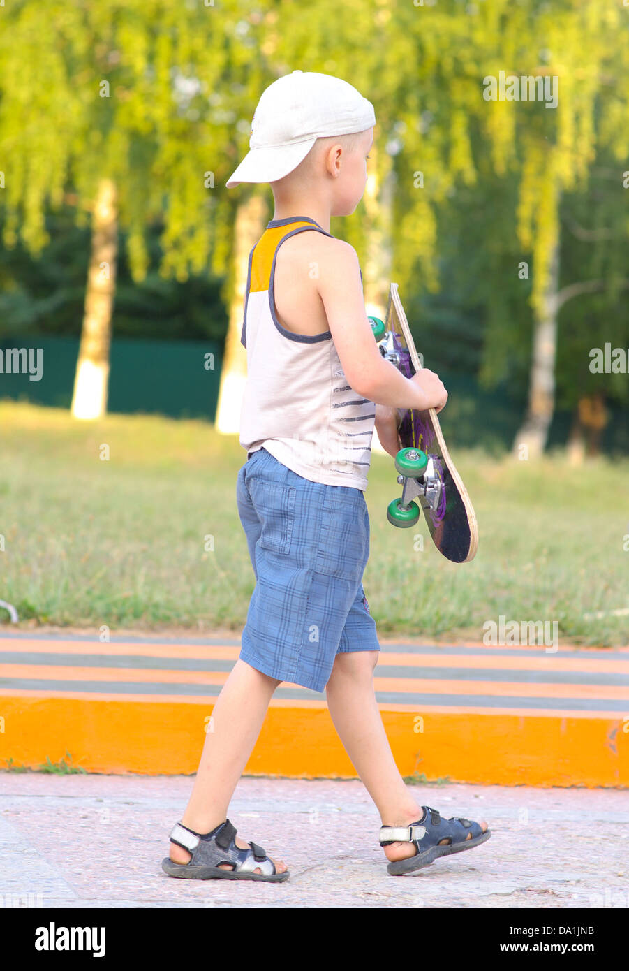 Boy Child Training Skateboard jumping Outdoor Summer Sport with nature ...