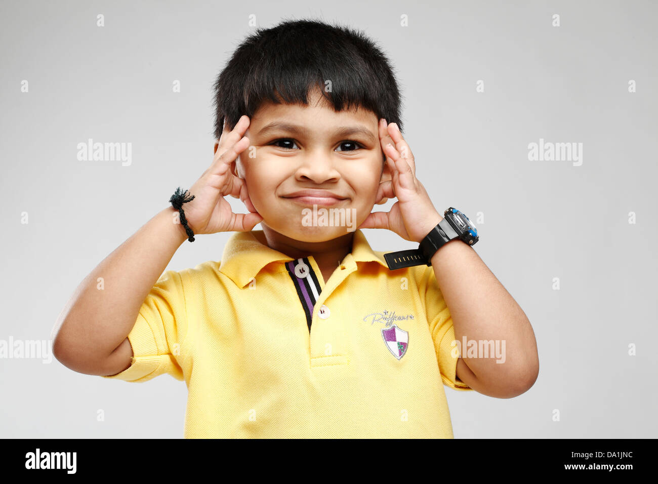Little Indian kid is giving happy expression Stock Photo - Alamy Little Indian kid is giving happy expression Stock Photo - Alamy