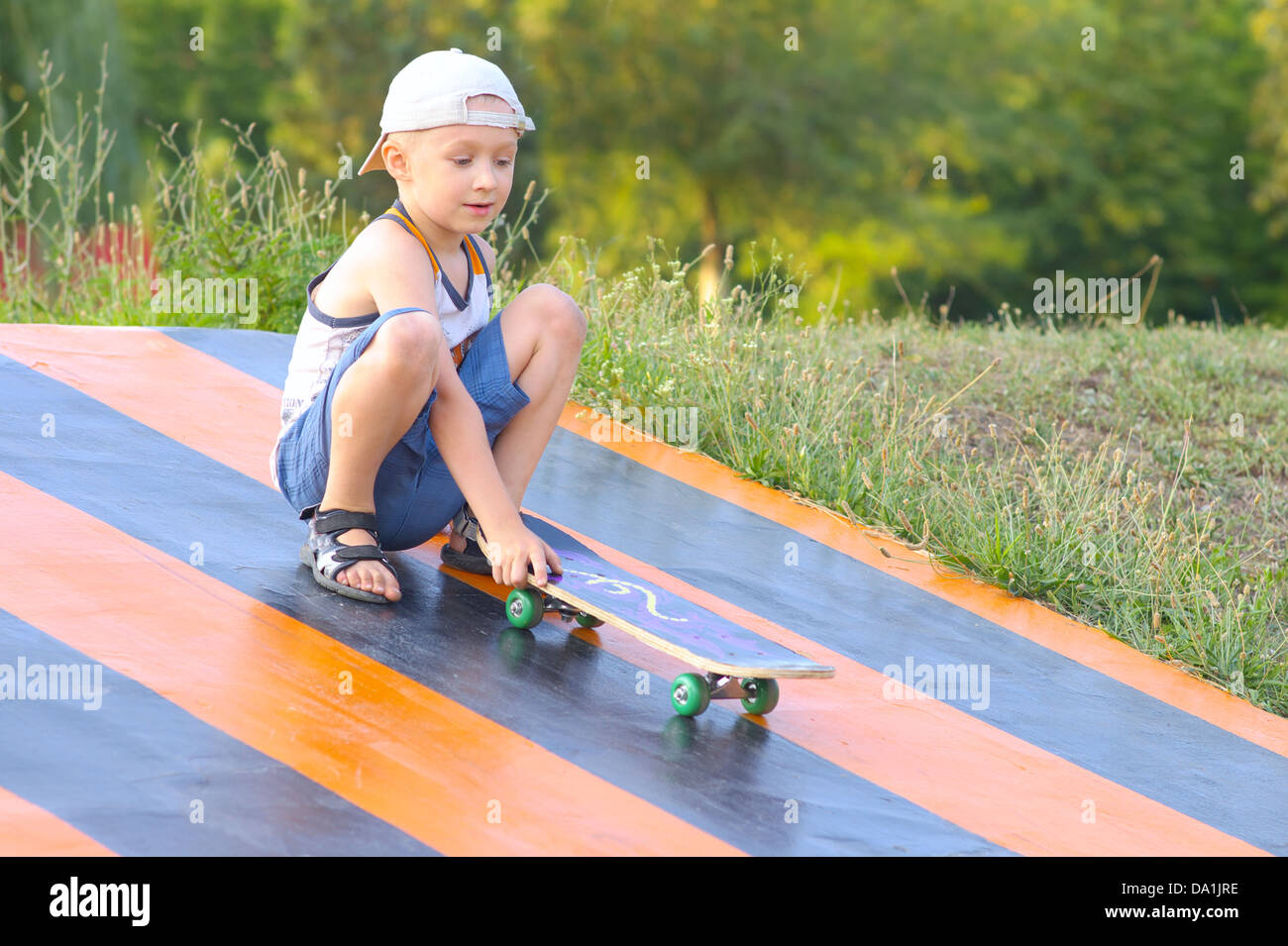 Boy Child Training Skateboard jumping Outdoor Summer Sport with nature ...