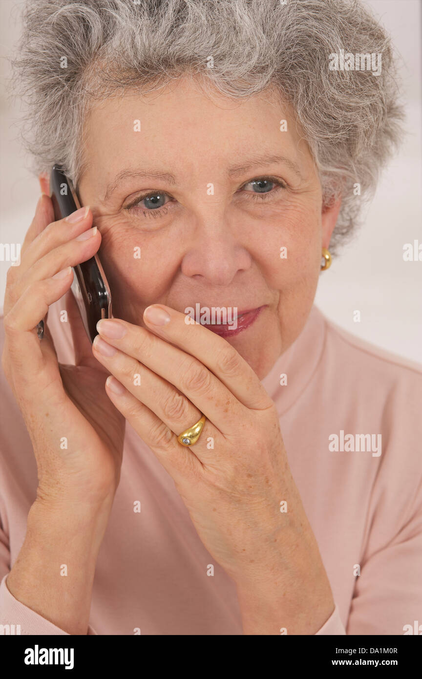 ELDERLY PERSON ON THE PHONE Stock Photo - Alamy