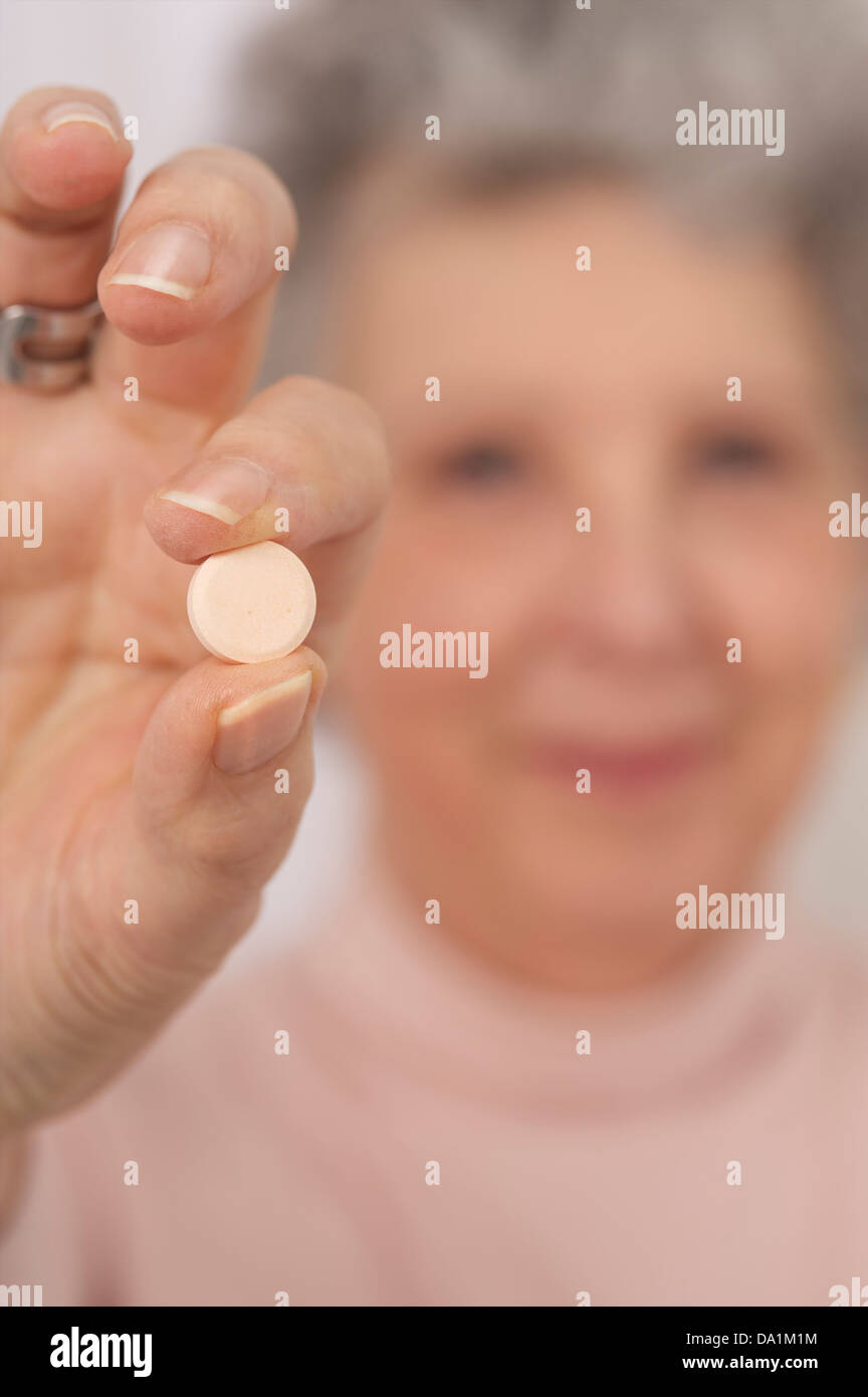 ELDERLY PERSON TAKING MEDICATION Stock Photo - Alamy