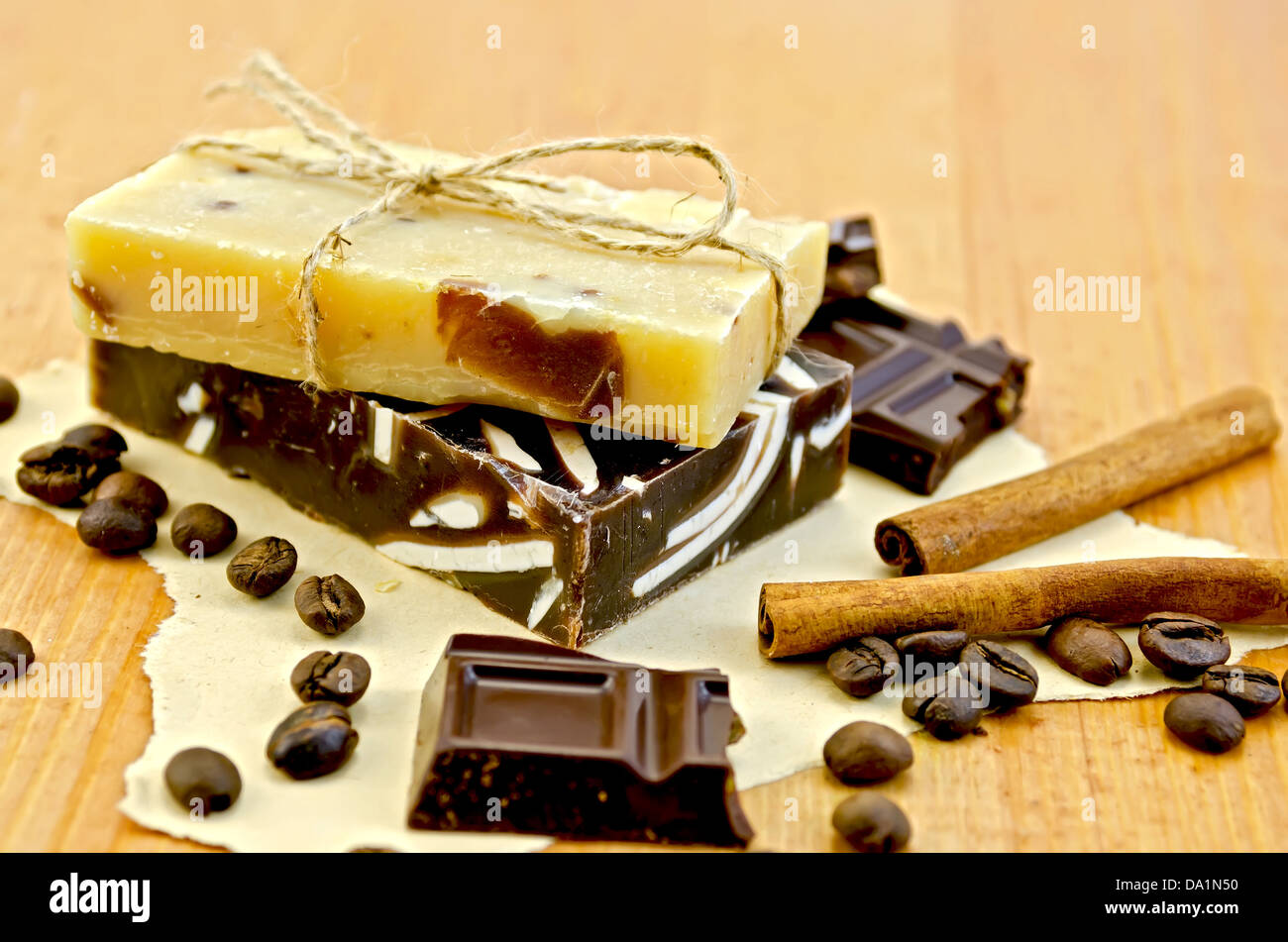 Two bars of homemade soap, tied with string, chocolate, cinnamon ...