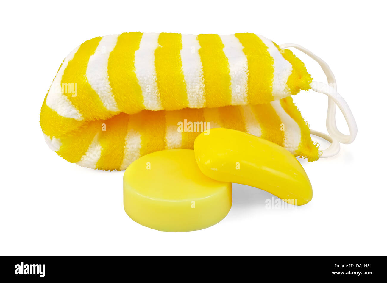 Two bars of yellow soap, washcloth with yellow and white stripes ...