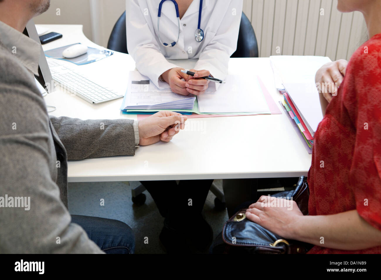 COUPLE IN CONSULTATION Stock Photo - Alamy
