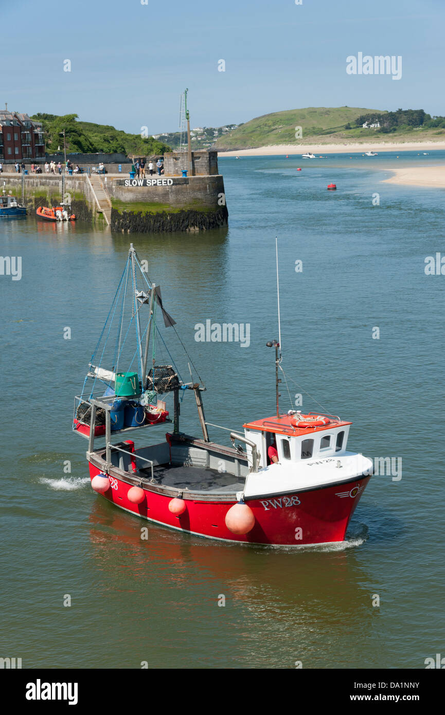 A fishing boat enters the harbour at Padstow Cornwall UK Stock Photo ...
