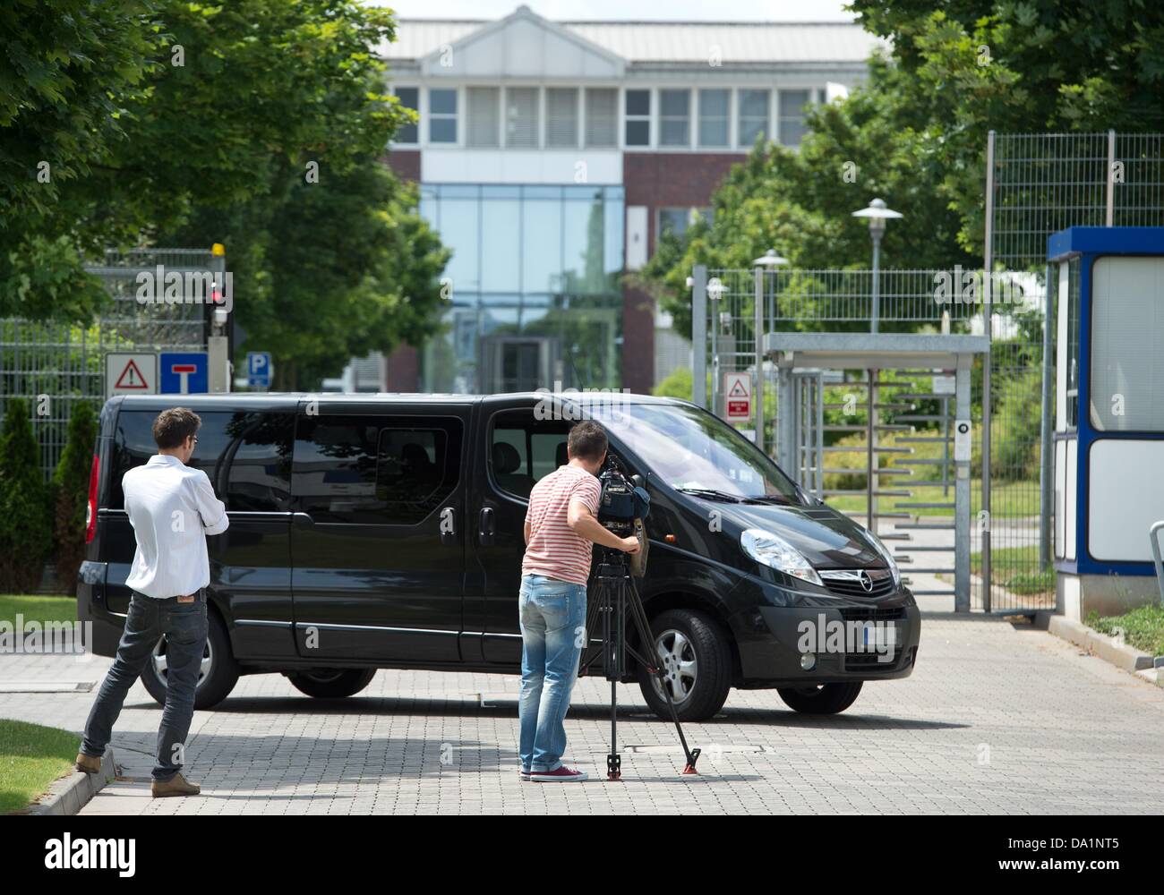 A barrier and a security camera secure the entrance to a server park in ...