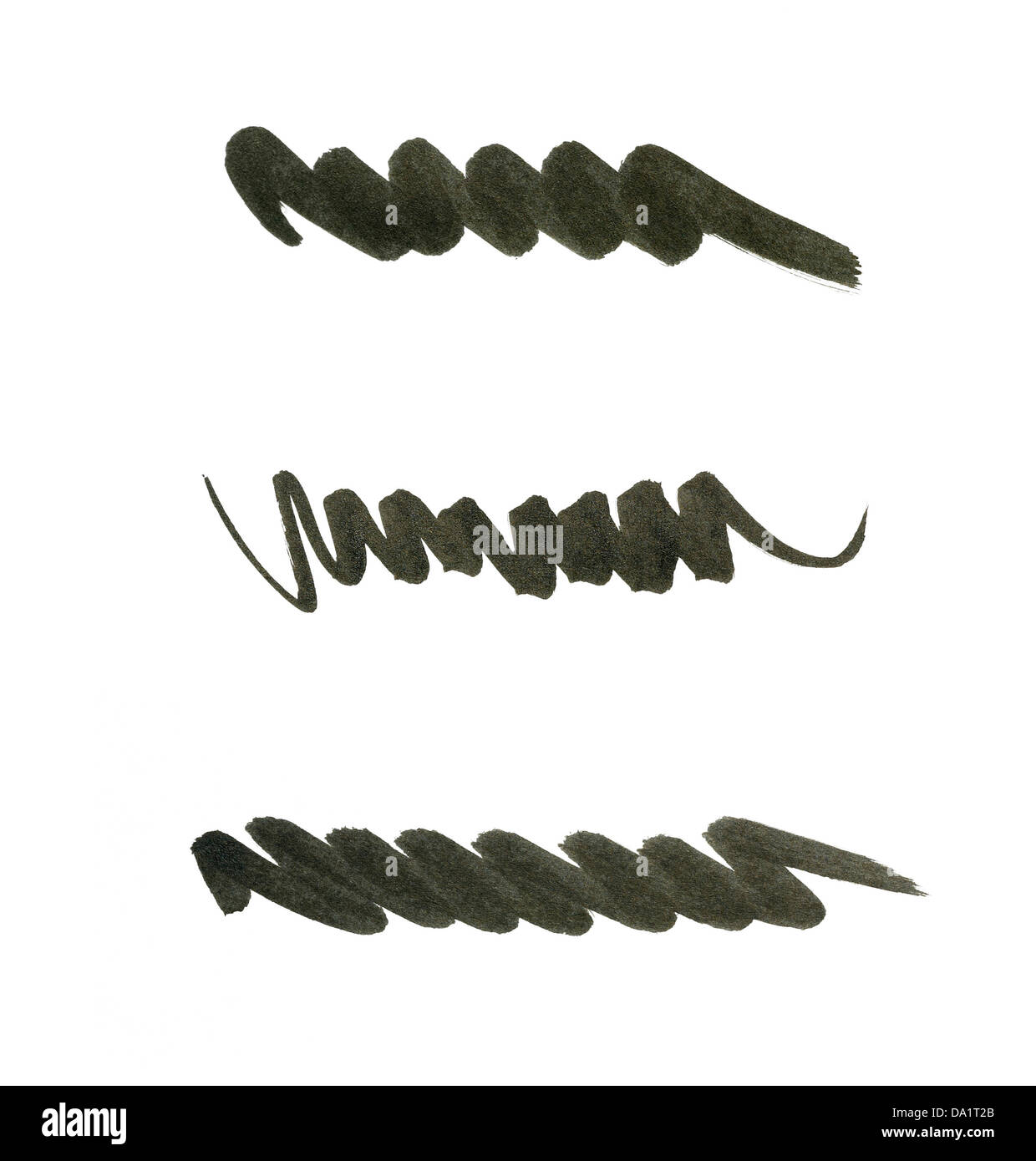 black liquid eyeliner squiggle cut out onto a white background Stock ...