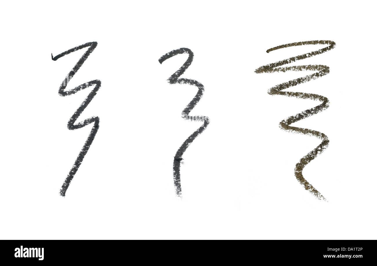 brown eyeliner squiggle cut out onto a white background Stock Photo - Alamy