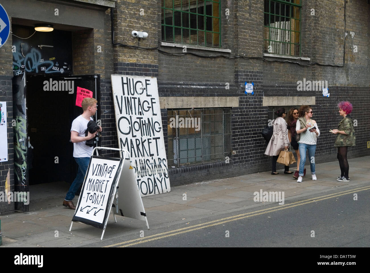 Vintage clothes market signs. Saturday afternoon Brick Lane London E1 ...