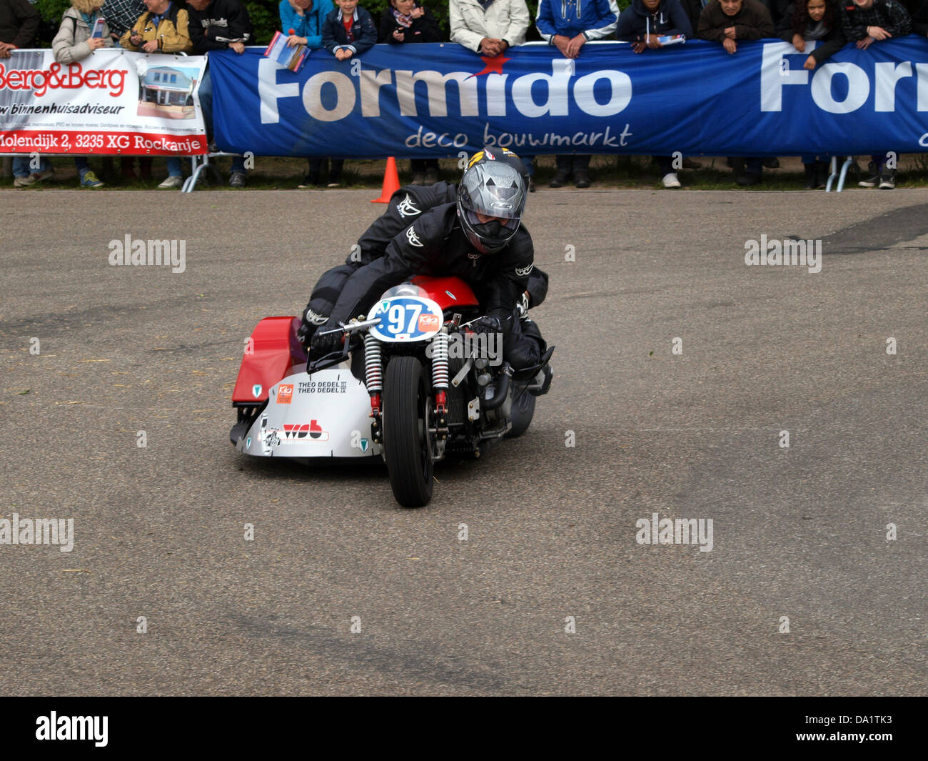 This photograph shows a DKW motorcycle combination no97, featuring a ...