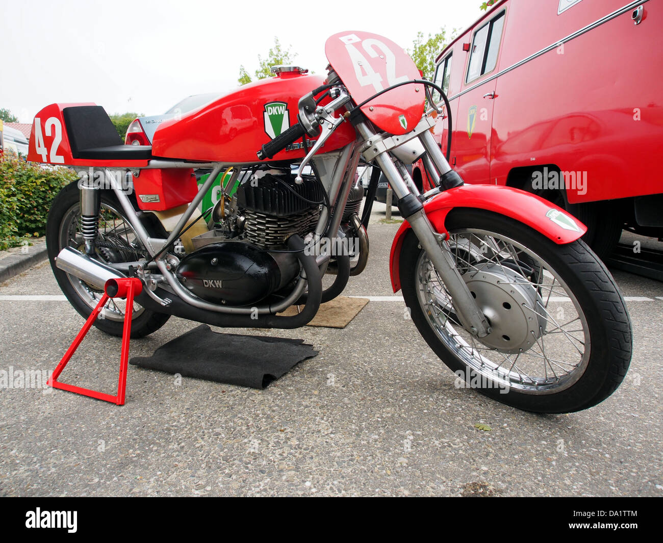 This image features a DKW racing car, number 42, during a competitive ...