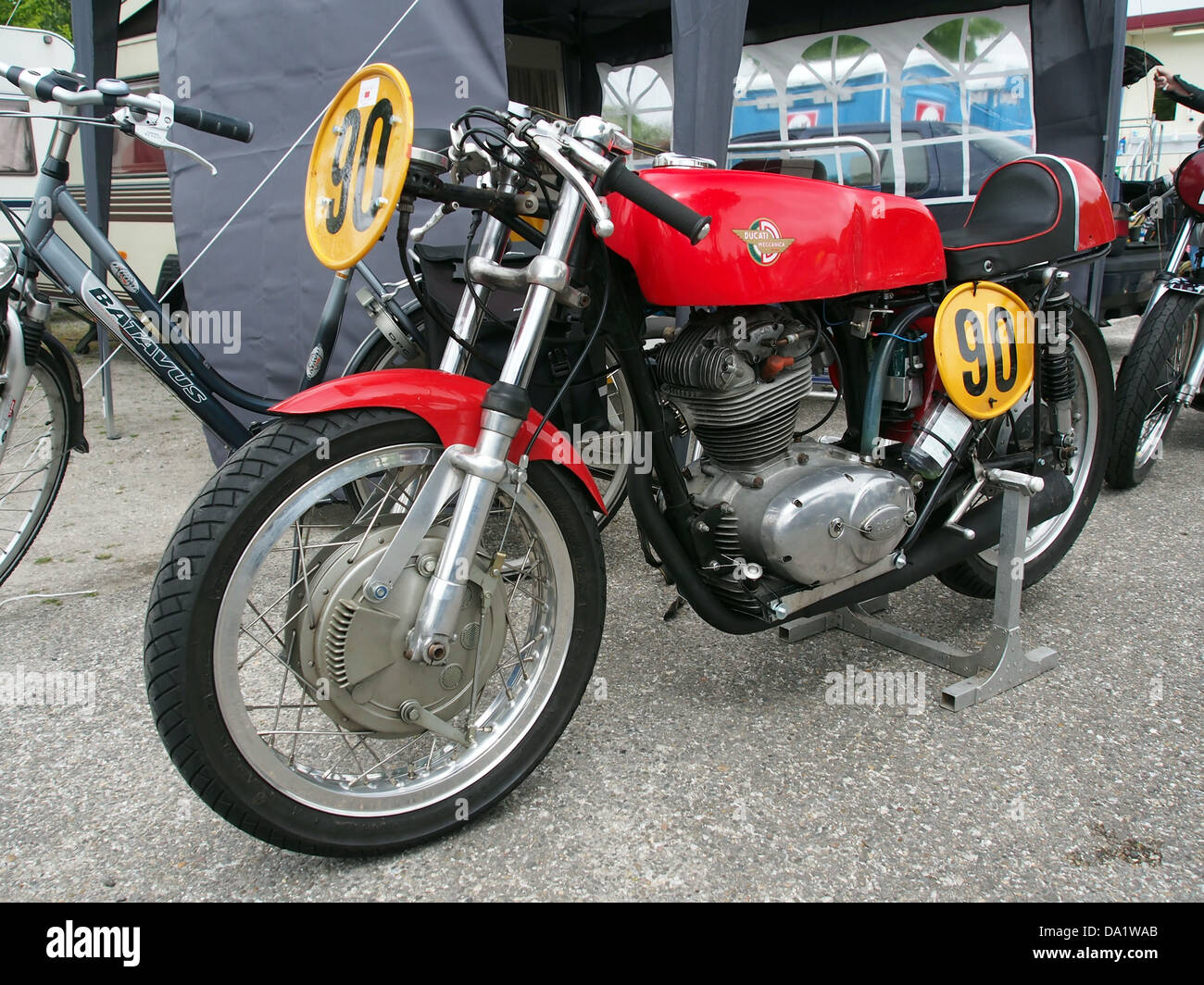 This photograph features the Ducati No90, a high-performance motorcycle ...