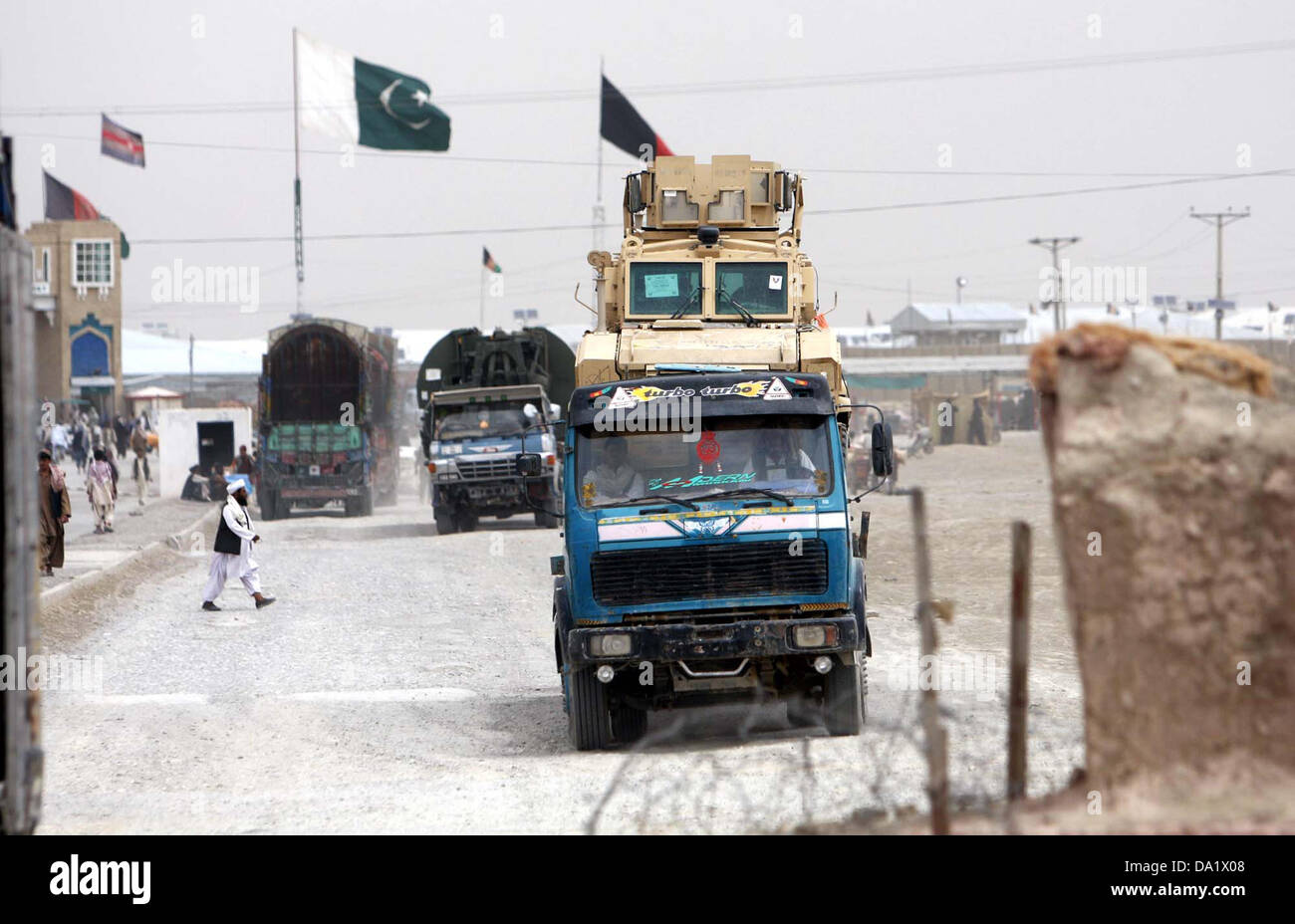 Trucks carrying US military equipments coming from Kandahar crossing ...