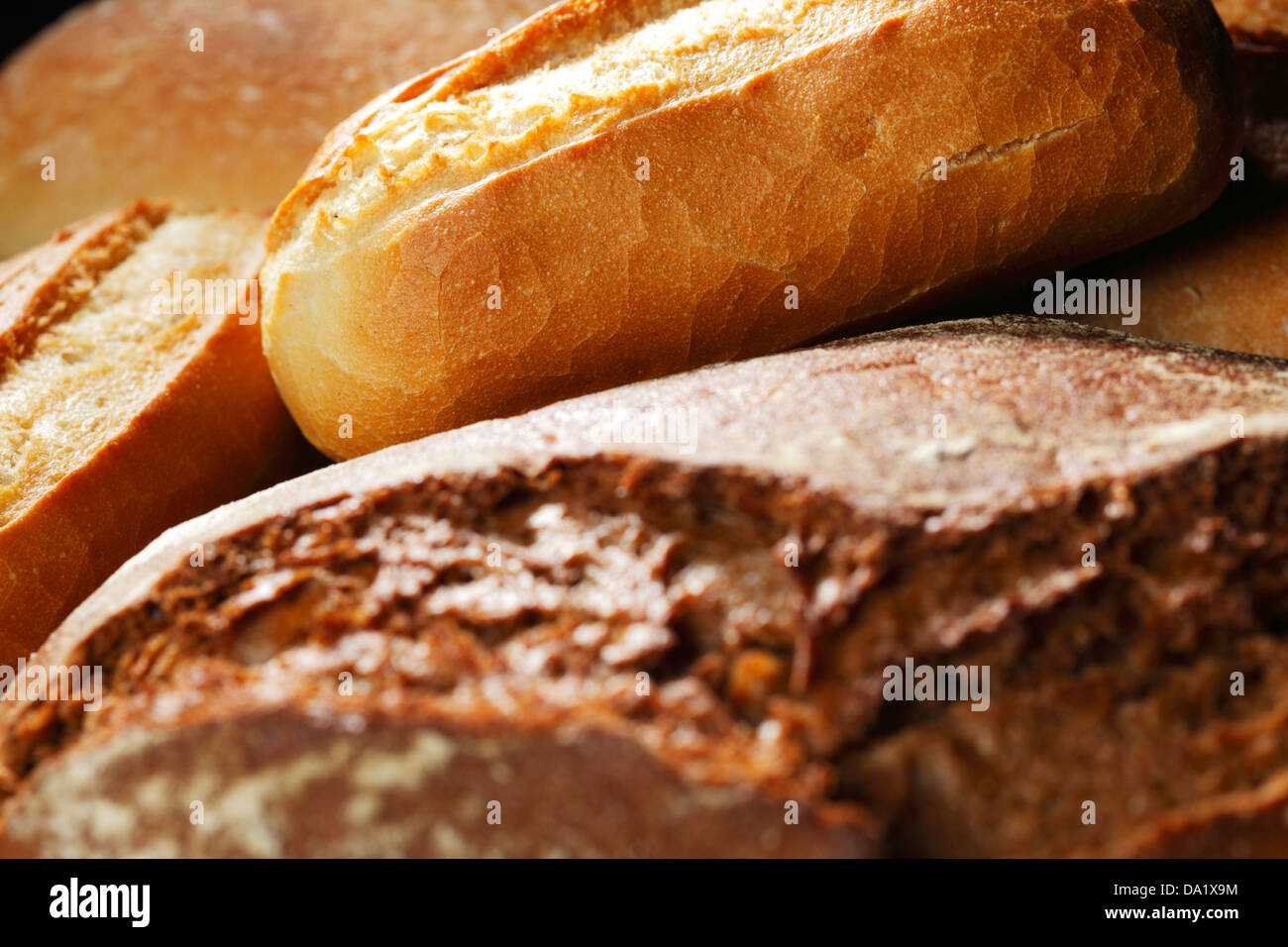 Various fresh bread background close-up Stock Photo - Alamy