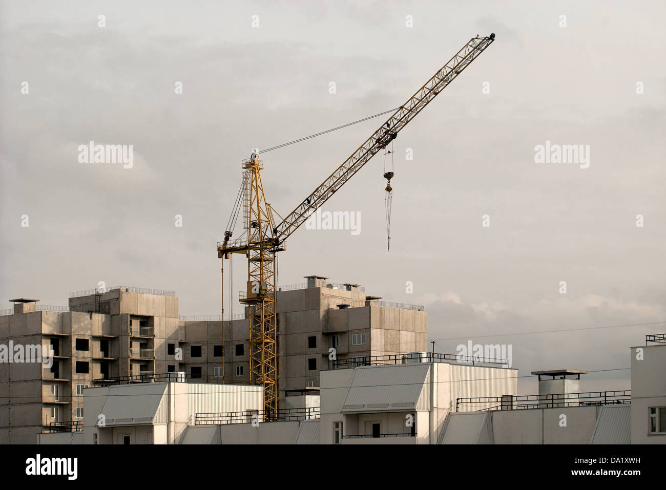 Hoisting crane at a construction site in Saint-Petersburg Stock Photo ...