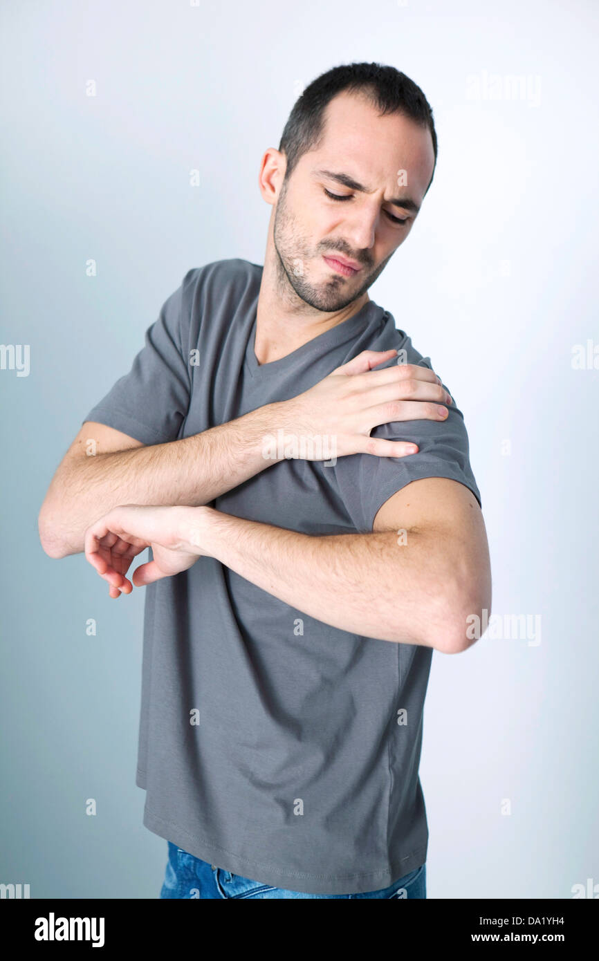 SHOULDER PAIN IN A MAN Stock Photo - Alamy