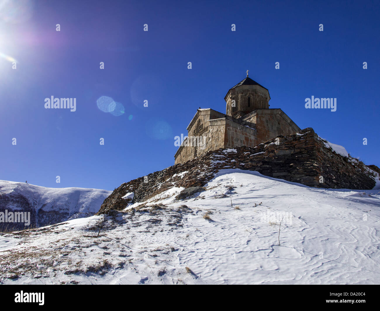 The Gergeti Trinity Church (Tsminda Sameba) in Caucasus Mountains in ...