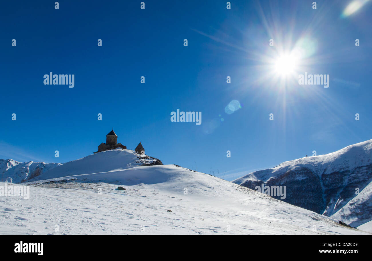 The Gergeti Trinity Church (Tsminda Sameba) in Caucasus Mountains in ...
