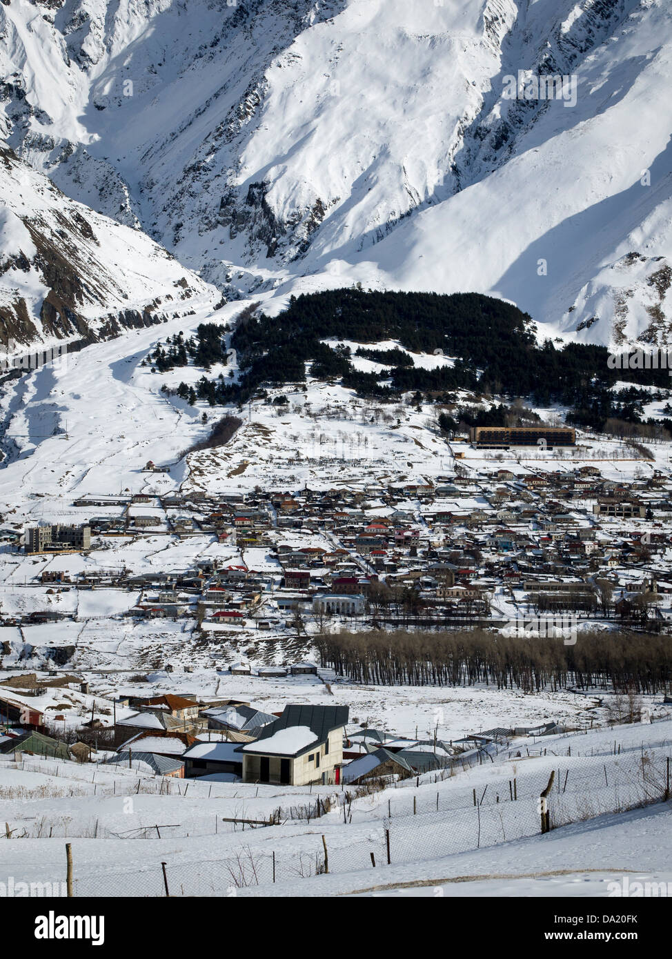 The town of Stepantsminda, formerly know as Kazbegi, in Caucasus ...