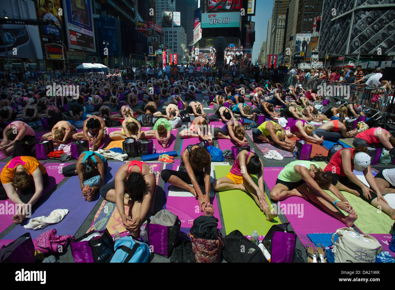 Thousands of yoga practitioners pack Times Square in New York Stock ...