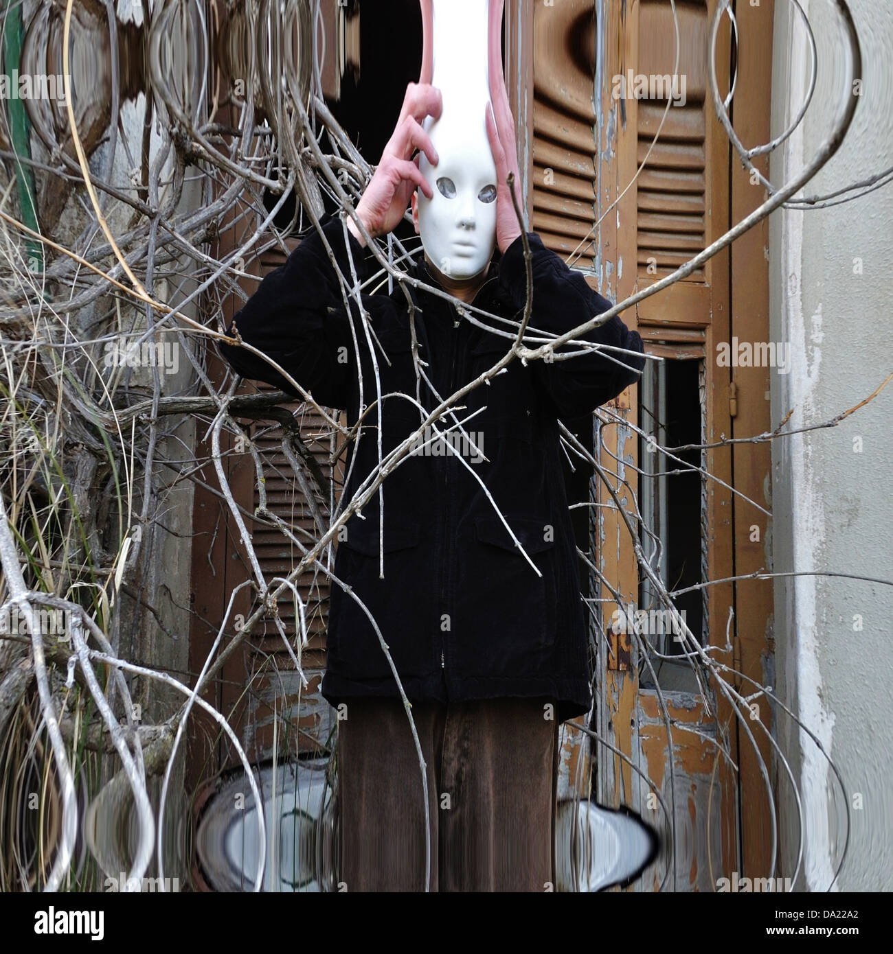 Distorted figure of man with white mask. State of confusion Stock Photo ...