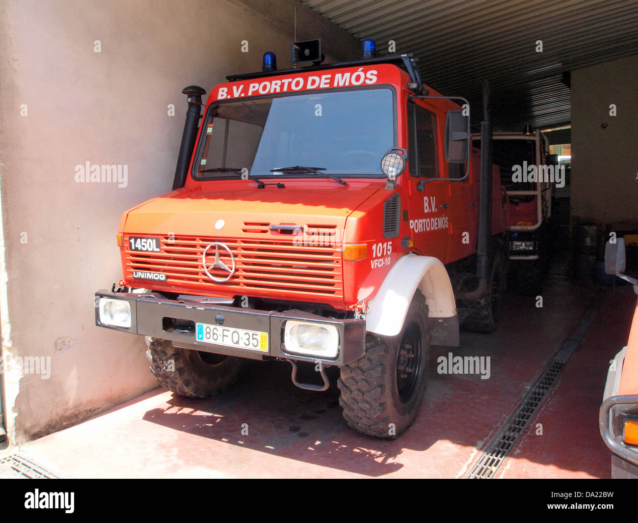 The image depicts a Mercedes 1450L Unimog, a firefighting vehicle used ...