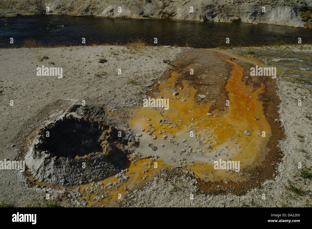Orange bacterial mat outlet stream descending slope towards Firehole ...
