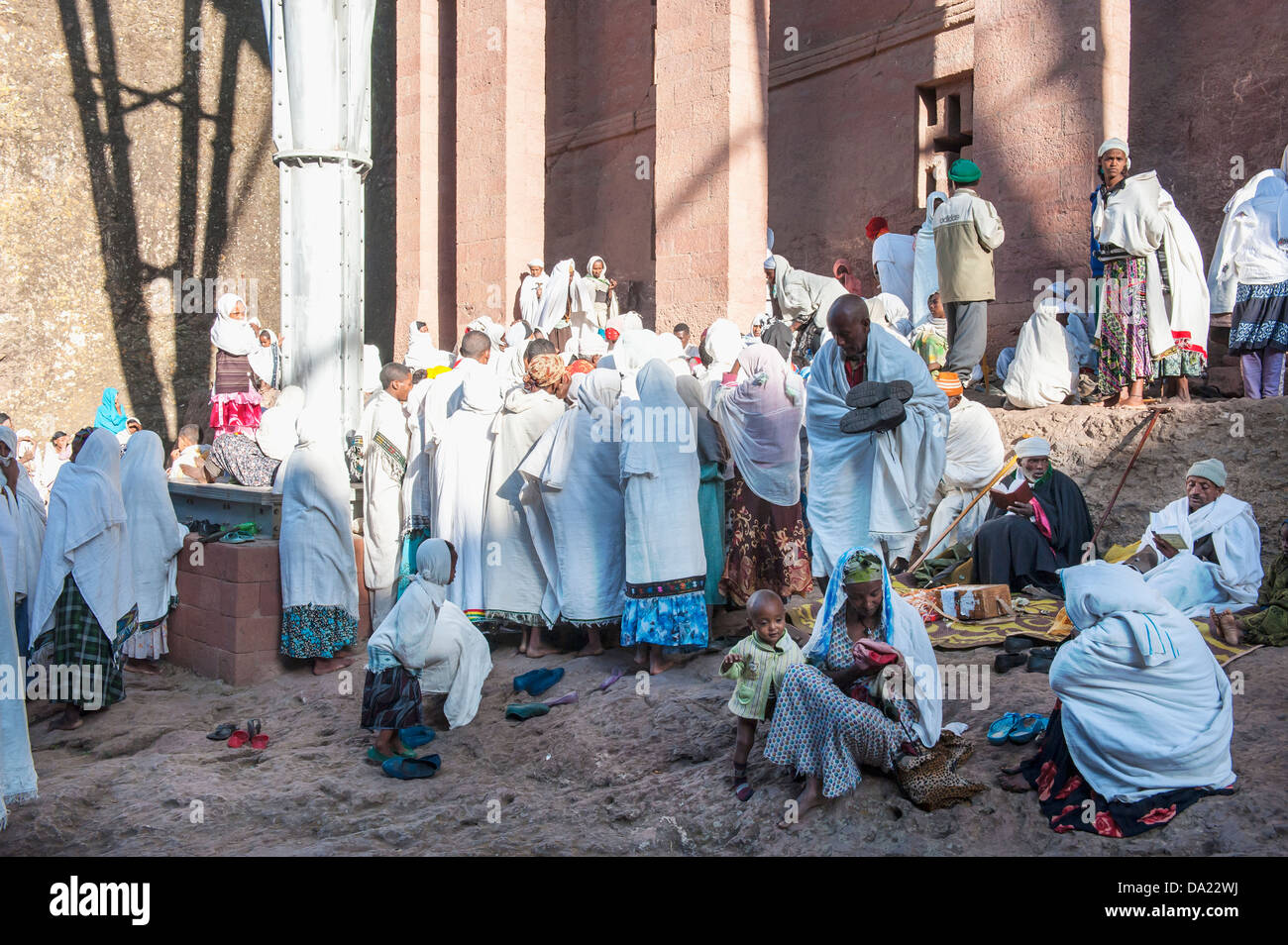 Pilgrims with the traditional white shawl attending a ceremony at the ...