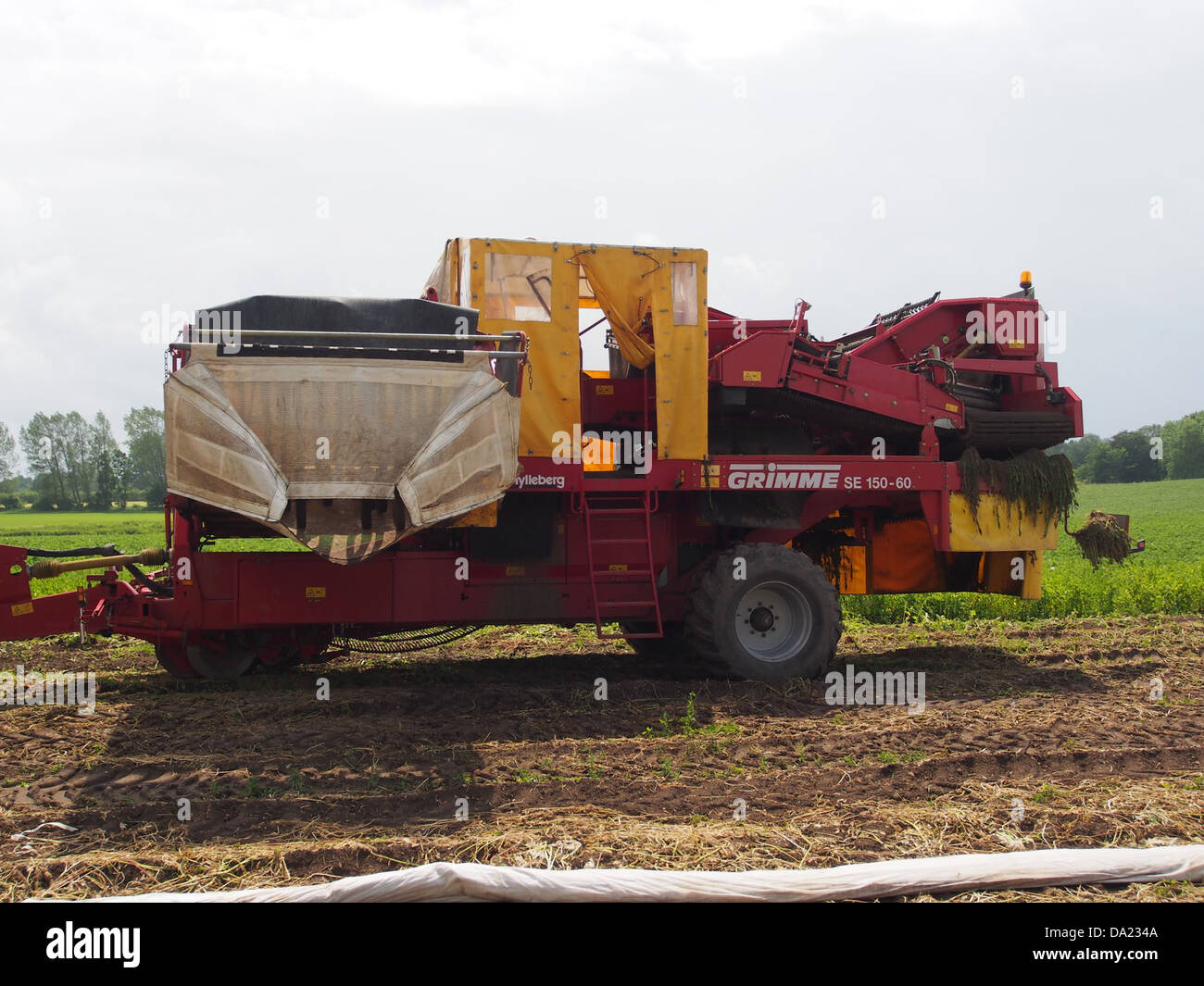 This photograph captures the GRIMME SE 150-60, a high-performance ...